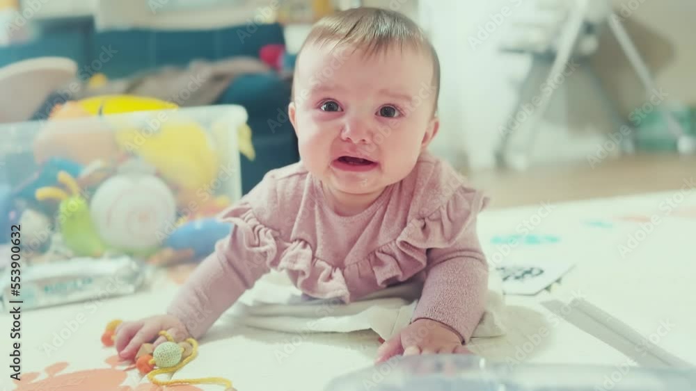 baby a newborn crying. little girl 6 months upset crying sad facial ...