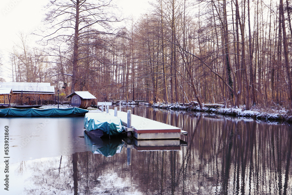Snow-covered barges in the Spreewald port of Schlepzig, Germany Stock ...