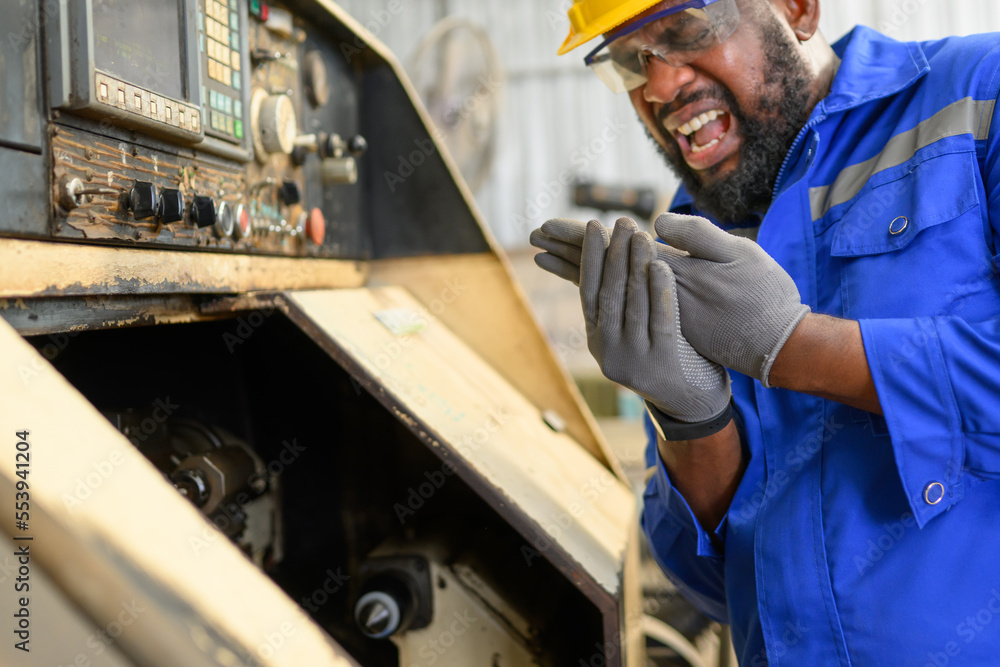 Hand accident, worker with hand injury from machine working. worker ...