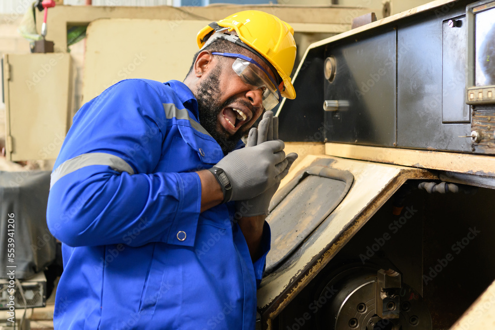Hand accident, worker with hand injury from machine working. worker ...