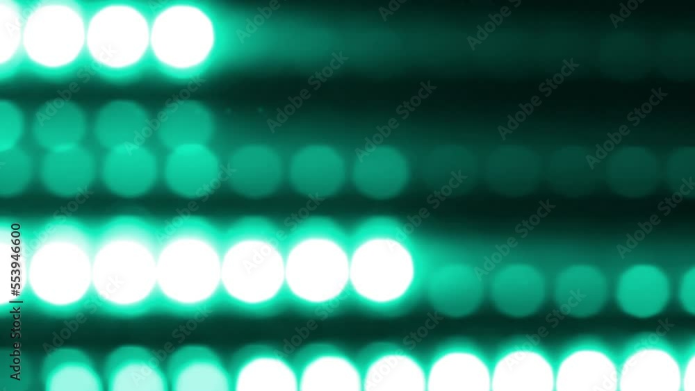 Lines of round Turquoise bokeh move horizontally. Abstract moving ...