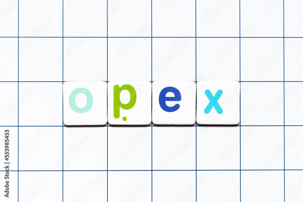 Colorful tile letter in word OPEX (abbreviation of operating expense ...