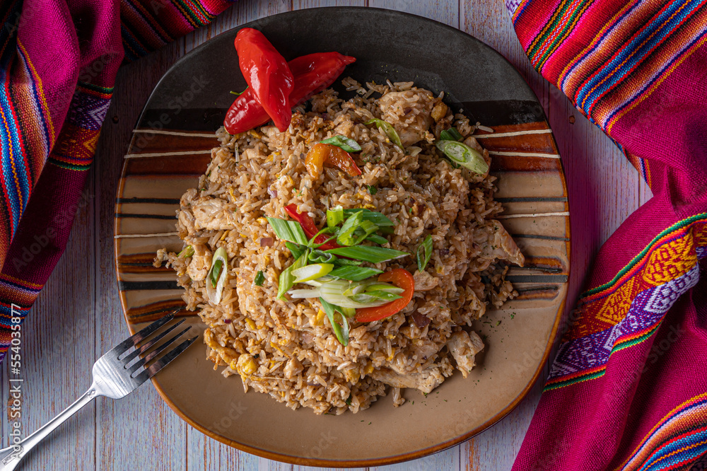 Chaufa de Pollo, Peruvian chicken fried rice. Stock Photo | Adobe Stock