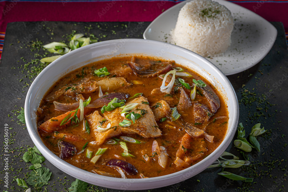 Sudado de Pescado, a traditional steamed fish stew from Peru served ...