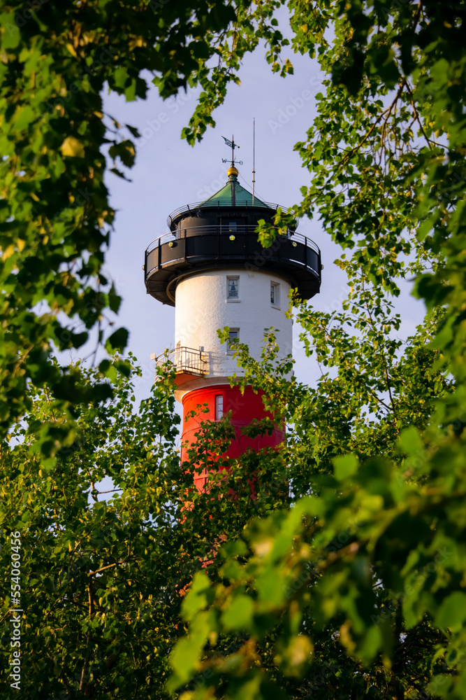 Historic old Lighthouse in sunlight on Wangerooge island Germany is a ...