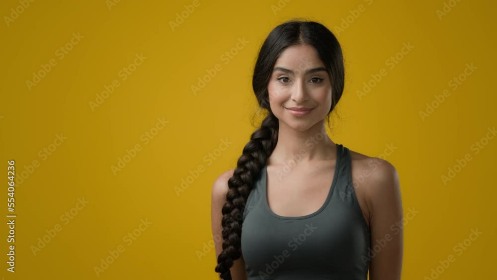 Calm casual sporty 20s Indian Ethnic multiracial woman with long braid ...