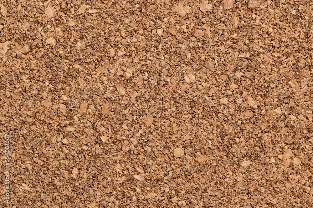 Untreated cork panel, close-up of the coarse texture of rough grained ...