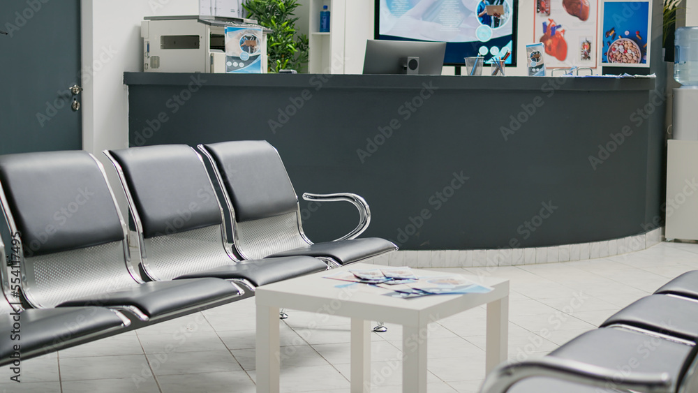Hospital reception space with waiting area in lobby, administative ...