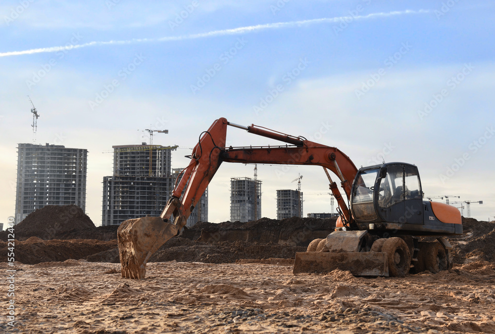 Excavator dig ground at construction site. Dig foundation. Construction ...