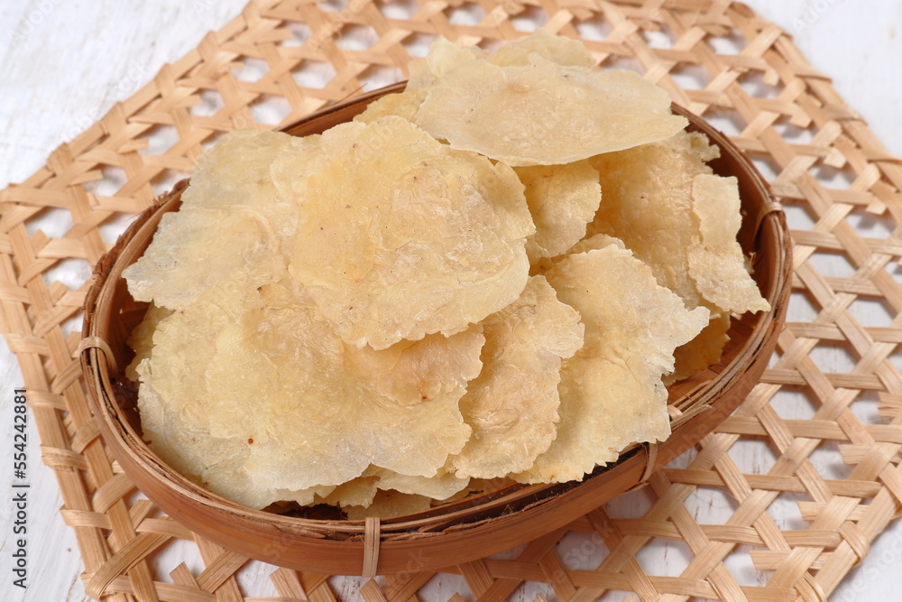 emping mlinjo . Indonesian chips, bite-sized snack crackers, are made ...