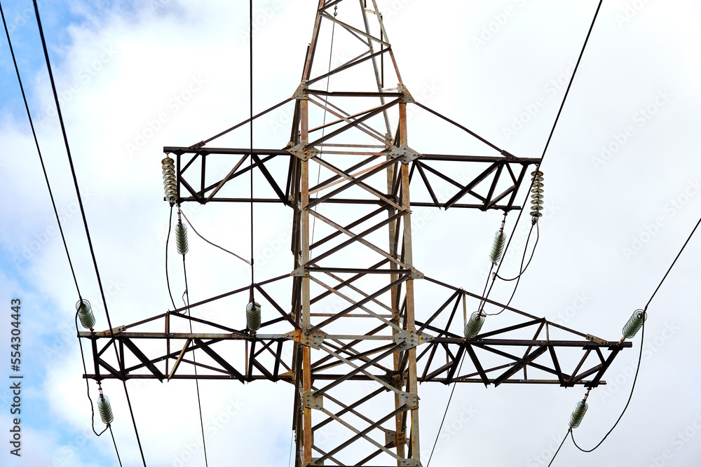 The large high-voltage transmission towers. Steel power pylon ...
