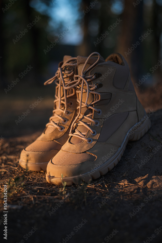 High-top lace-up sneakers in military color. Tactical army specialized ...