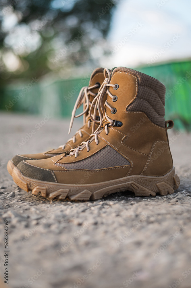 High-top lace-up sneakers in military color. Tactical army specialized ...