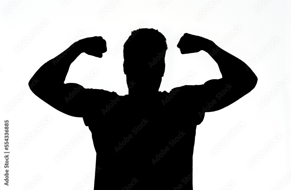 Man raising his arms making biceps and sign of victory and strengt ...