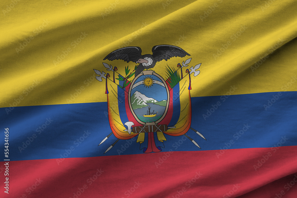 Ecuador flag with big folds waving close up under the studio light ...
