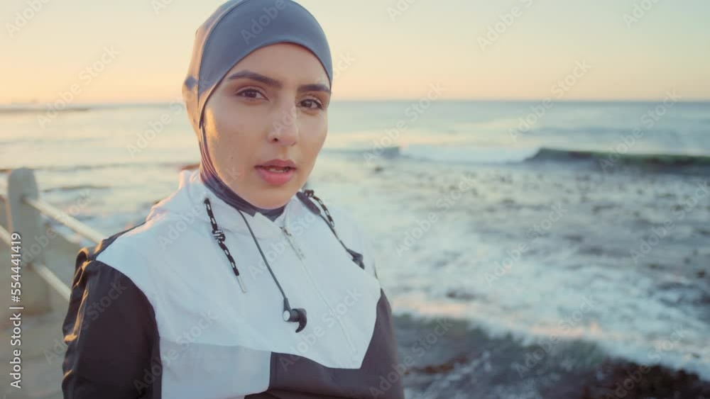 Muslim face, tired or beach fitness rest by sunset ocean or Dubai sea ...