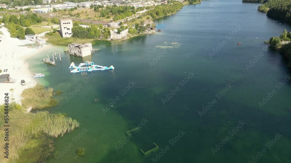 Abandoned Rummu quarry for extraction of limestone, turquoise lake with ...
