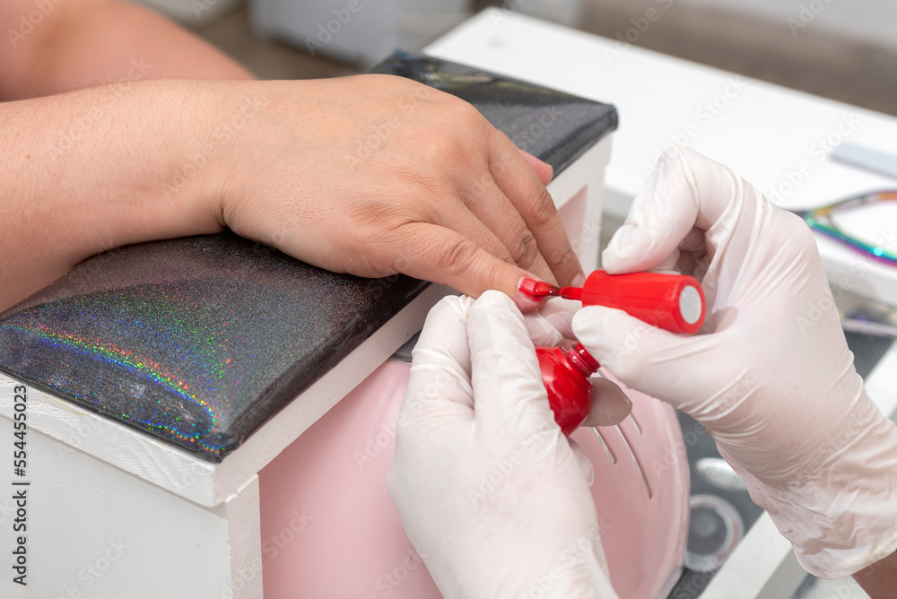 process of embellishment and treatment of fingernails in an aesthetic ...