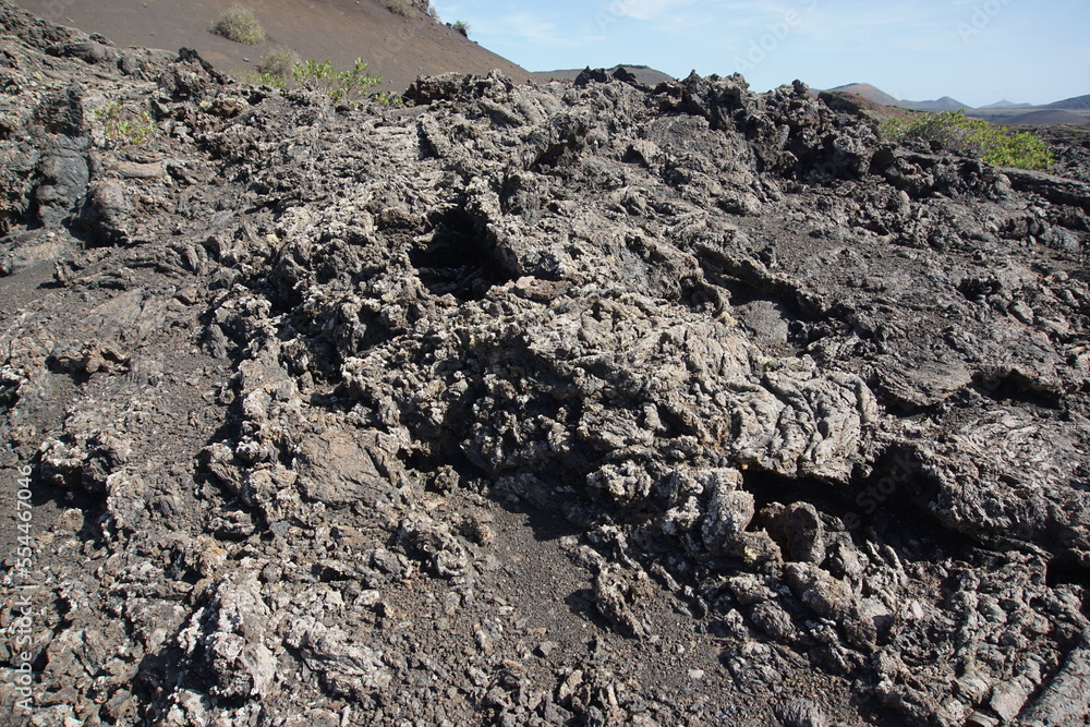 Volcanic landscapes of Lanzarote. Solidified lava, lava chimney, lava ...