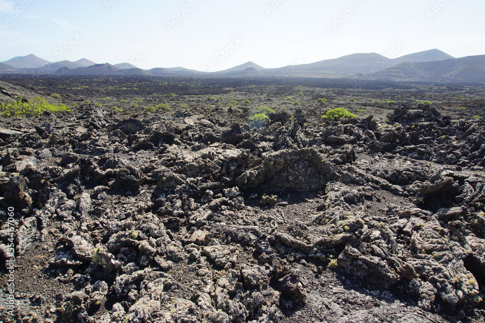 Volcanic landscapes of Lanzarote. Solidified lava, lava chimney, lava ...
