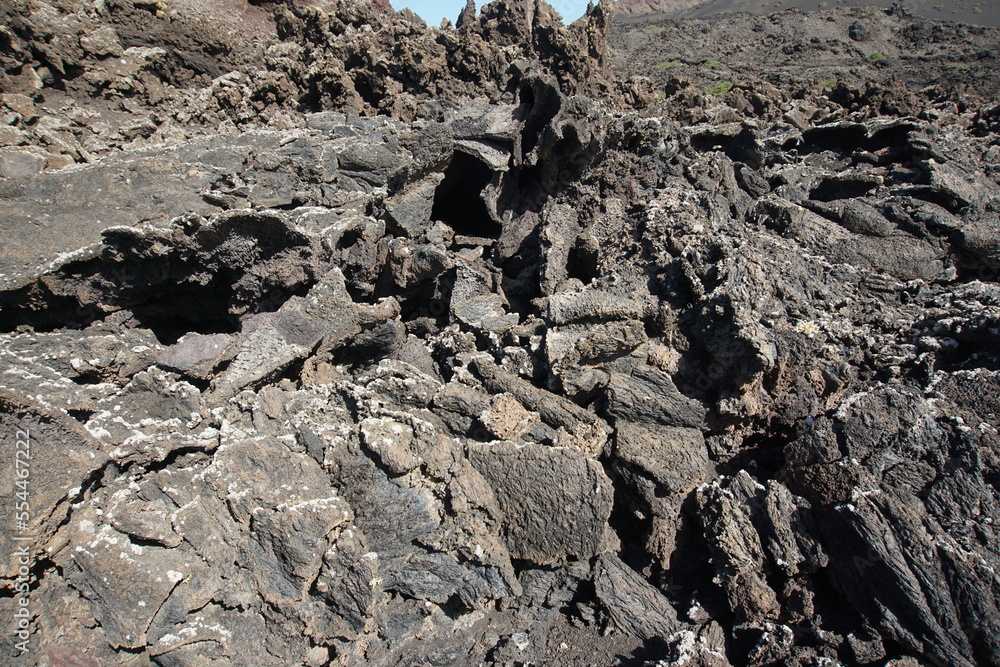 Volcanic landscapes of Lanzarote. Solidified lava, lava chimney, lava ...