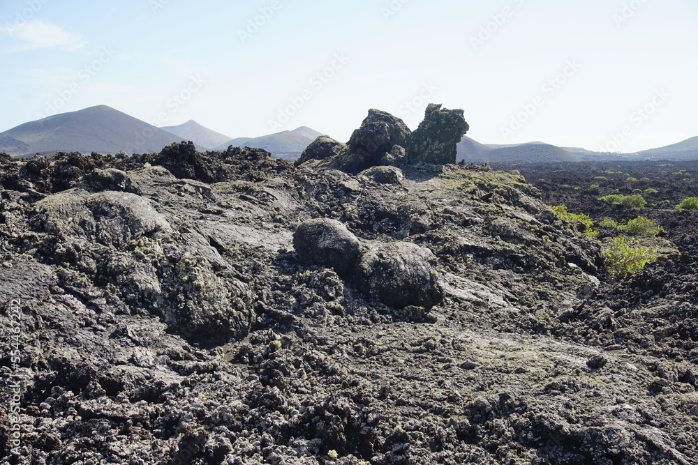 Volcanic landscapes of Lanzarote. Solidified lava, lava chimney, lava ...