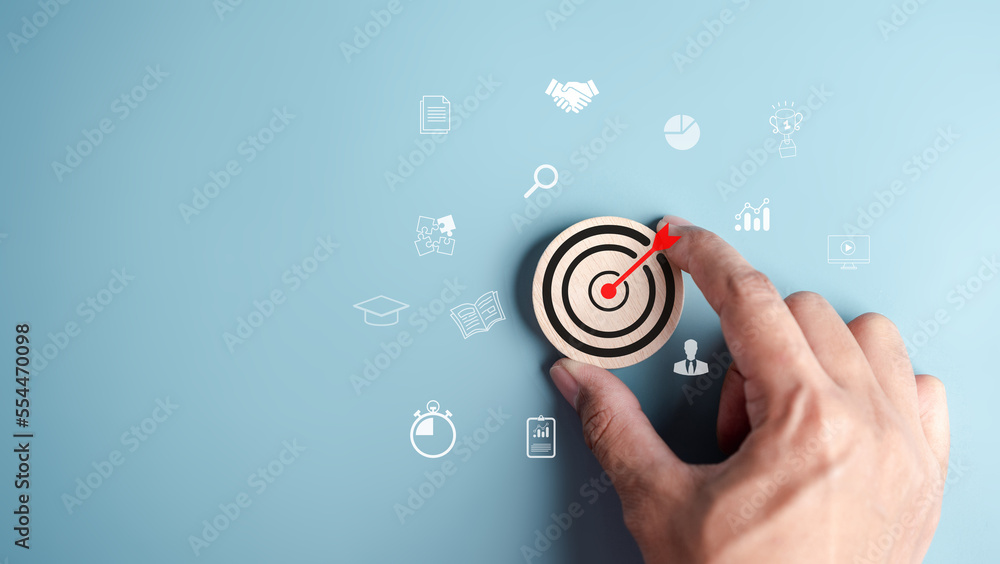 Aiming target dashboard on wooden circle for planning development ...