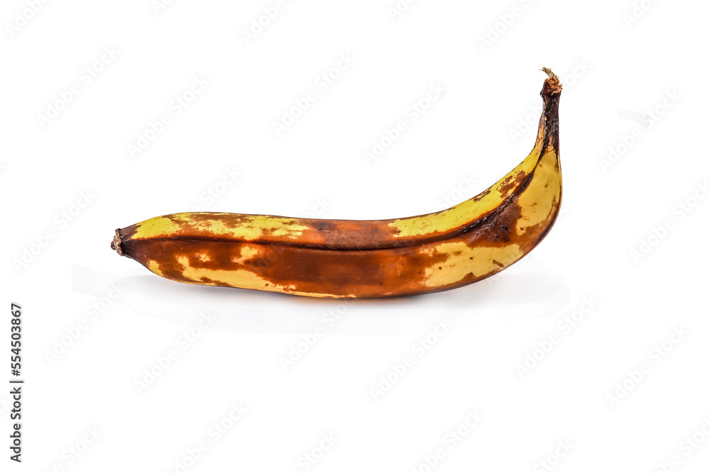 Old overripe banana as a symbol of age and aging on a white background ...