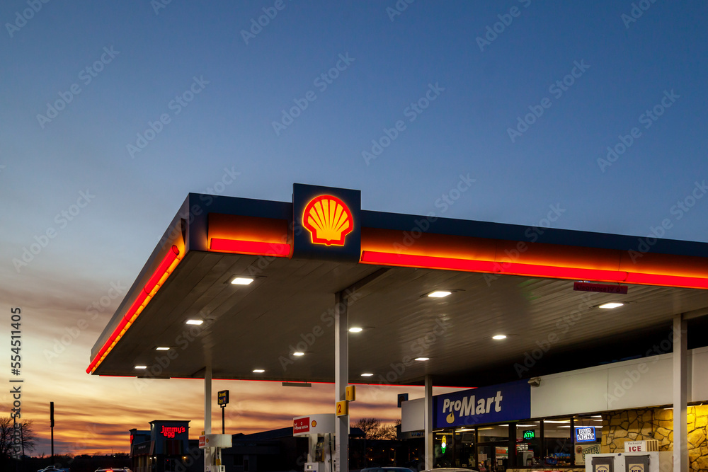 Irving, Texas, USA - March 20, 2022: A Shell gas station at dusk. Shell ...