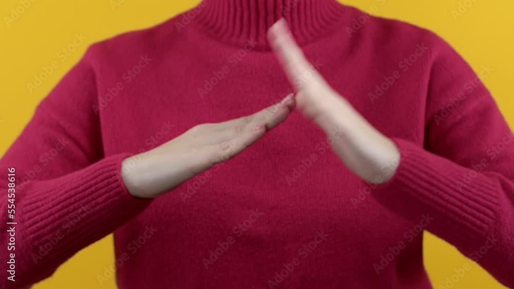 Hands showing timeout gesture, limit, stop, time break on yellow red ...