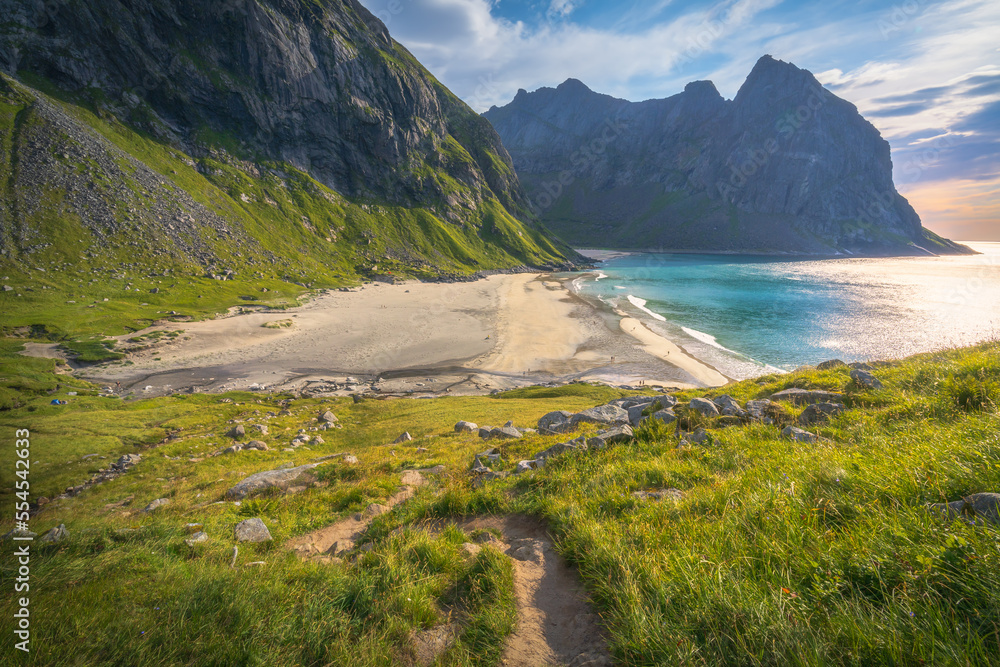 beautiful sunset at kvalvika beach on the lofoten islands in norway ...