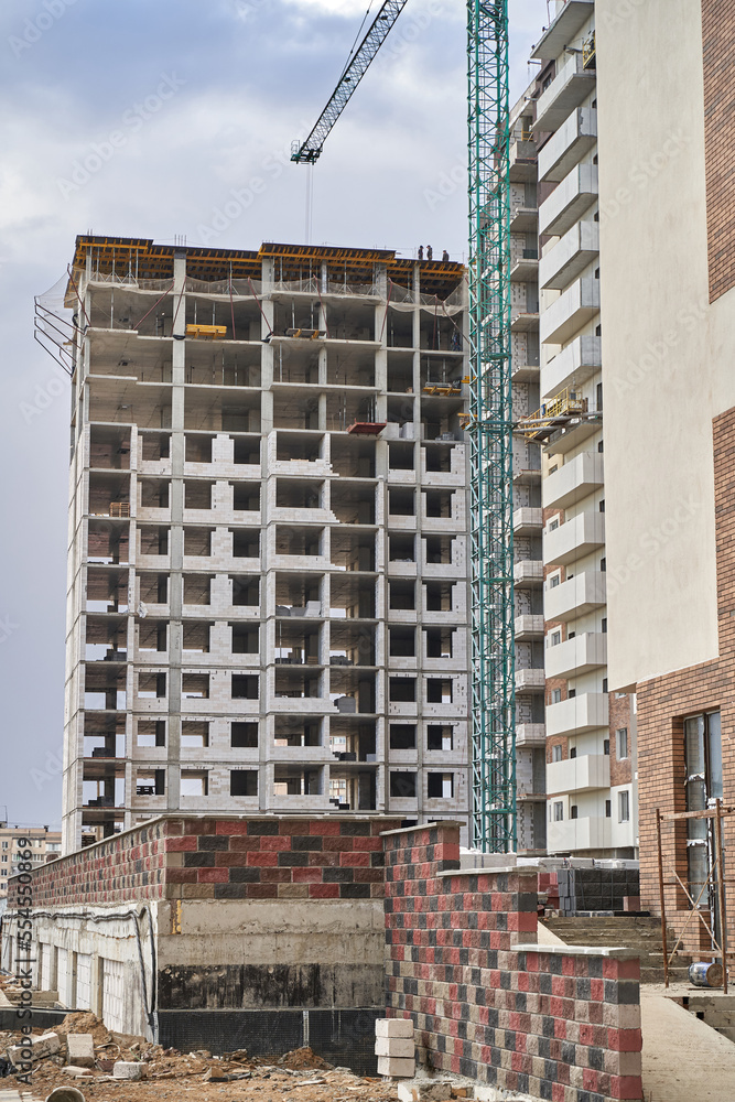 Construction site. High rise Building under construction. Construction ...