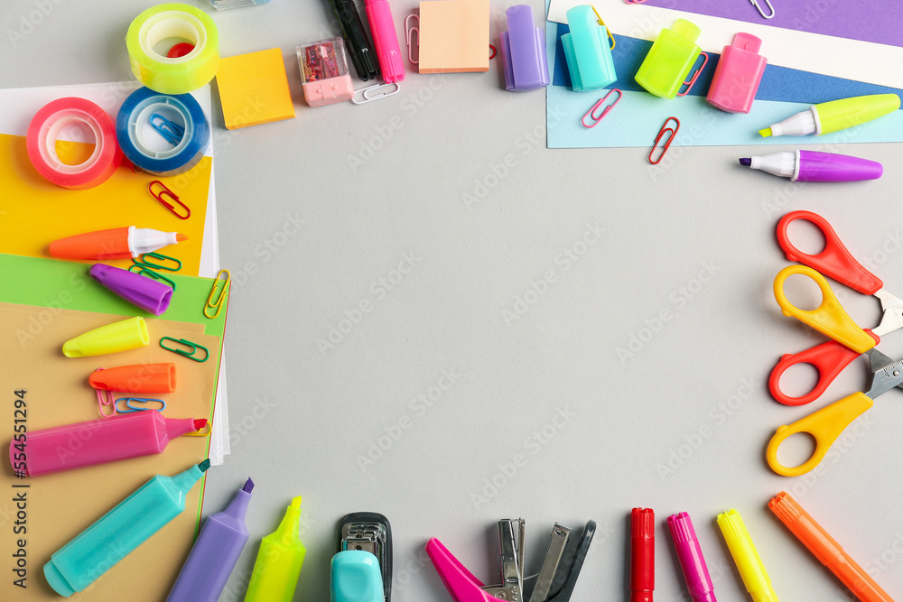 Frame made of different stationery on grey background Stock Photo ...