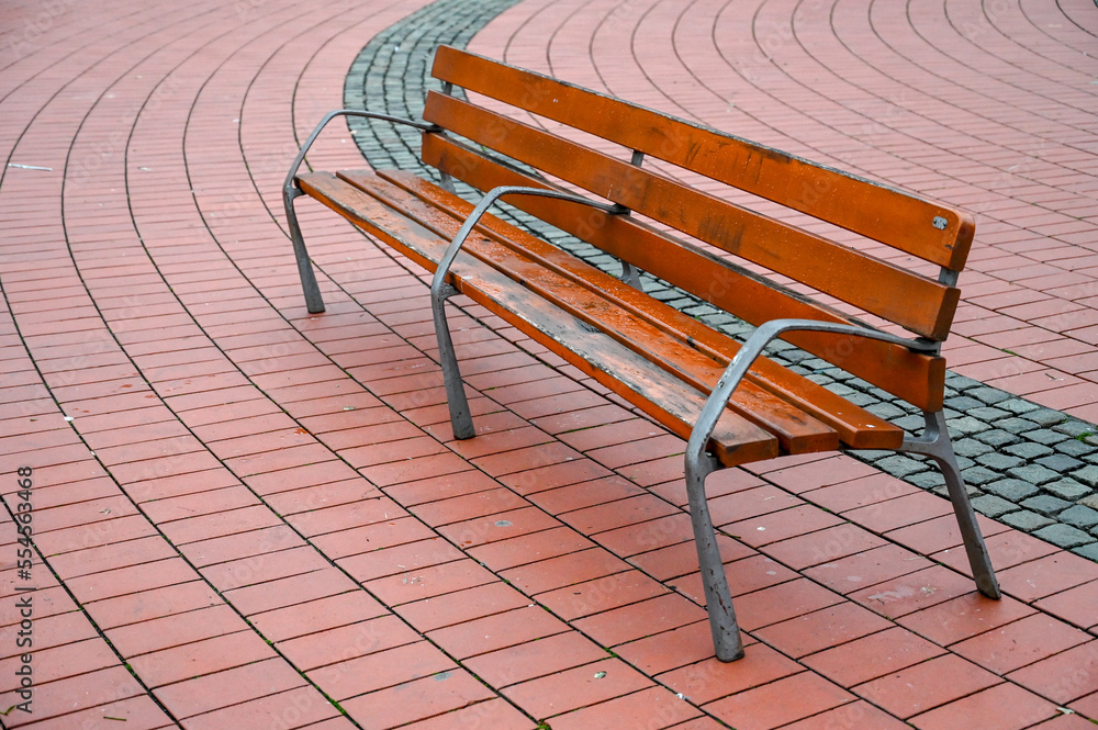 Hostile architecture. Bench with metal armrests designed to stop people ...