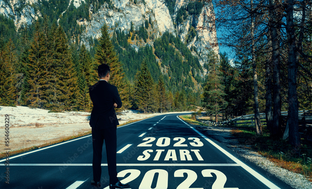 The 2023 New Year journey and future vision concept . Businessman ...