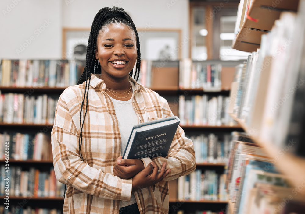 Portrait, black woman and library with book, knowledge and relax with ...