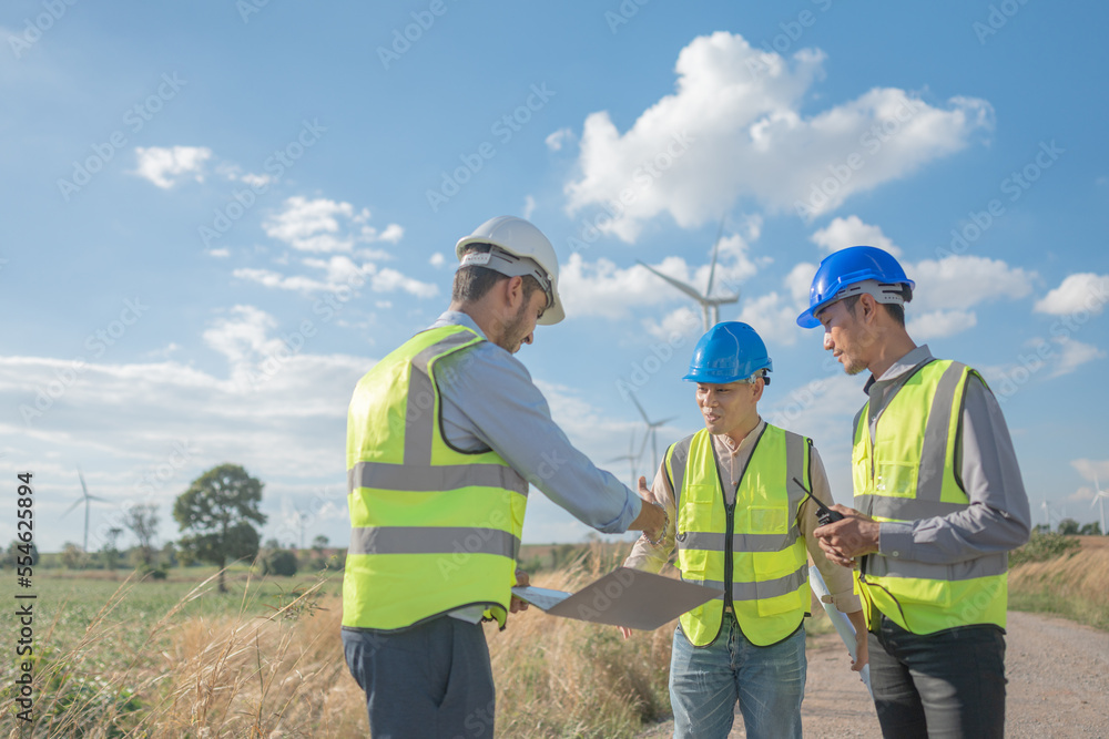 Asian engineers working in fieldwork outdoor. Workers walking and ...