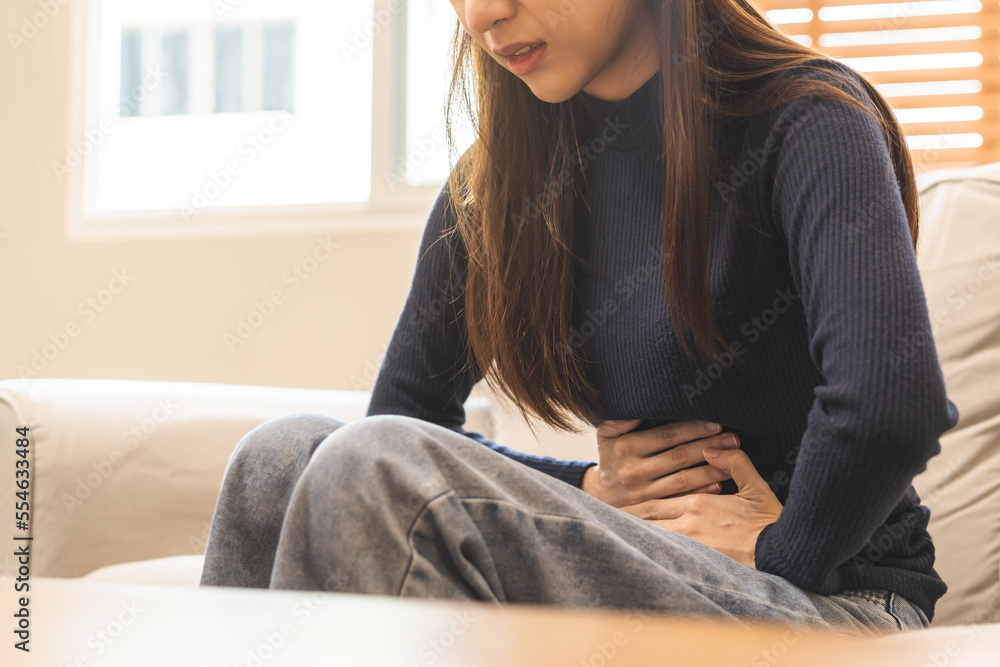 Flatulence asian young woman, girl hand in stomach ache, suffer from ...