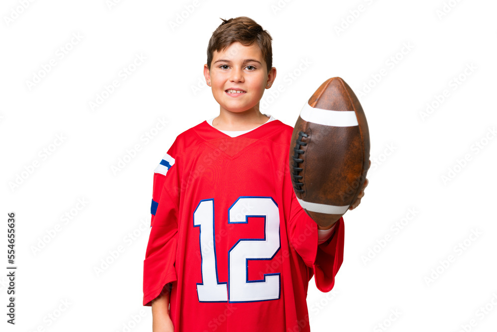 Little caucasian kid playing rugby over isolated chroma key background ...