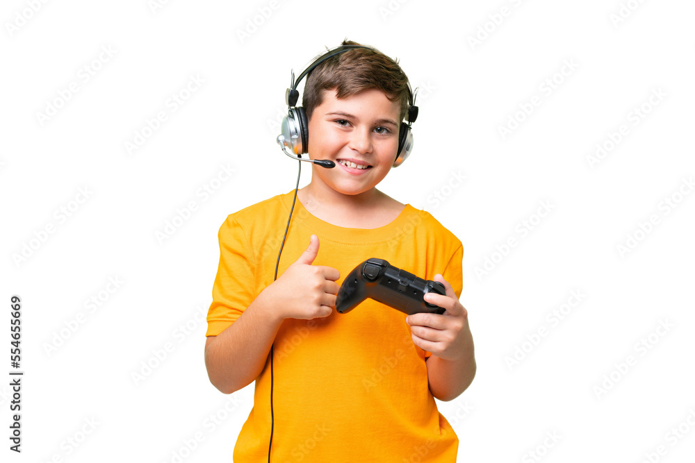 Little caucasian kid playing with a video game controller over isolated ...