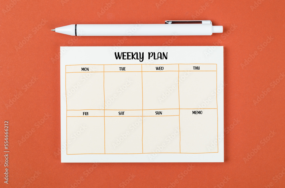The Blank weekly plan notice block on orange colour background. Empty ...