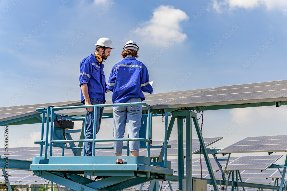 Electrical engineers are examining the working conditions of many solar ...