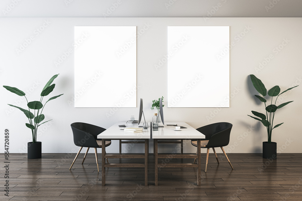 Front view on two blank white posters on light wall background in ...