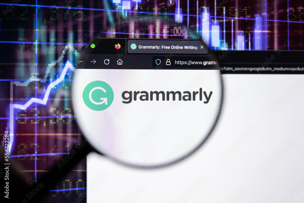 Grammarly company logo on a website with blurry stock market ...