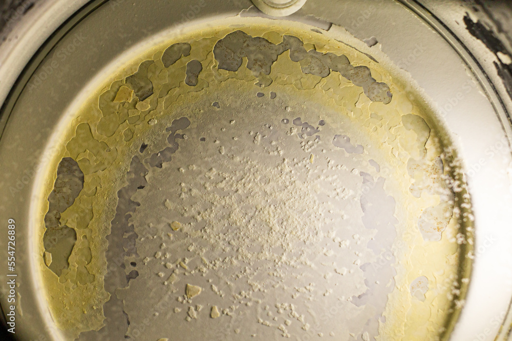 Minerals in bottom of boiler - Scale Buildup in Your Water Heater Stock ...