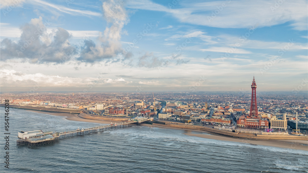 Blackpool Tower and sea front, aerial view over the Irish sea showing ...