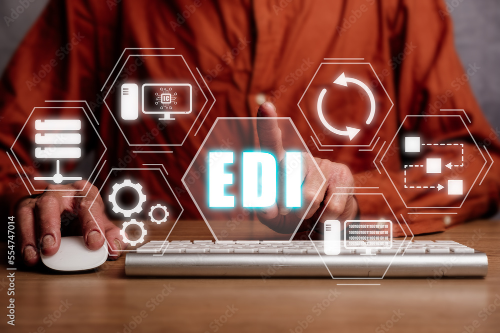 EDI-electronic data interchange concept, Person using computer on ...