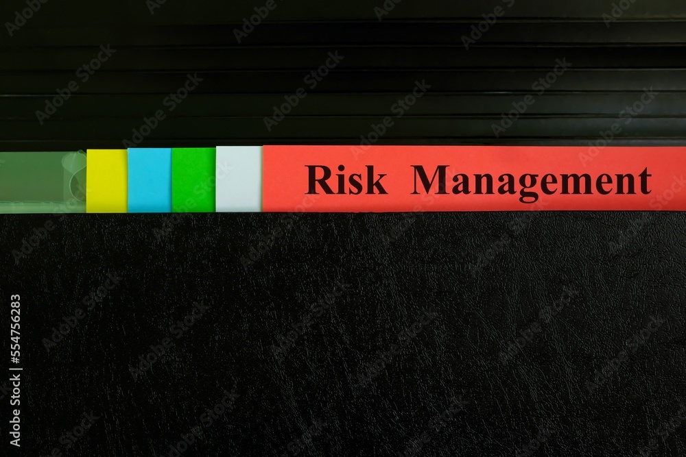 Risk management file record in black binder folder. Risk management ...