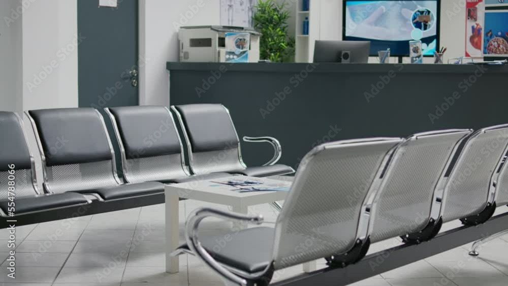 Professional waiting room with chairs in clinic hallway, reception ...