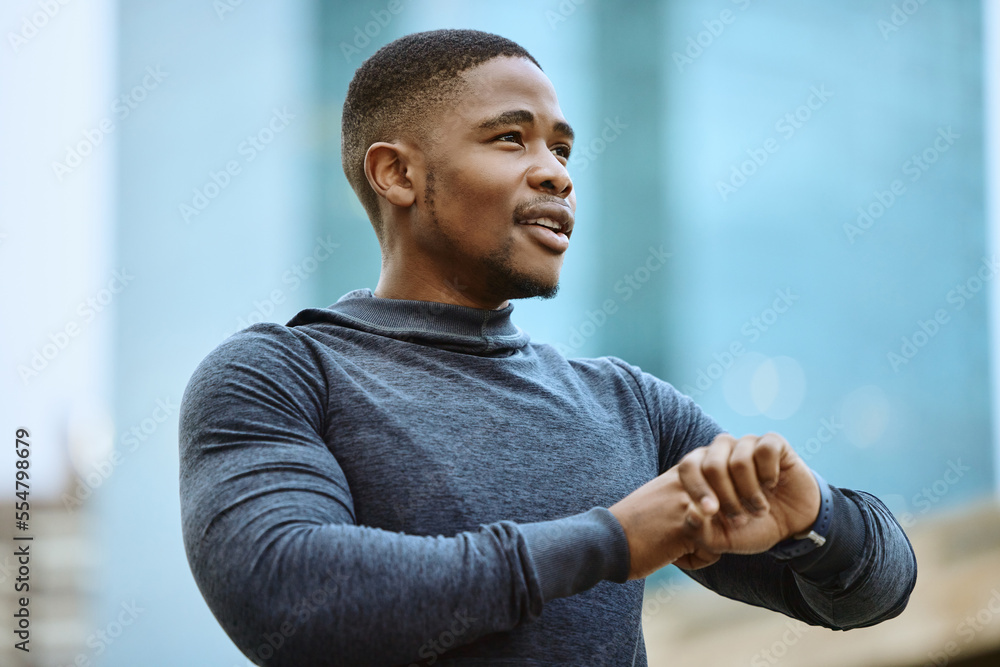 Running, fitness and watch with a sports black man checking his time ...